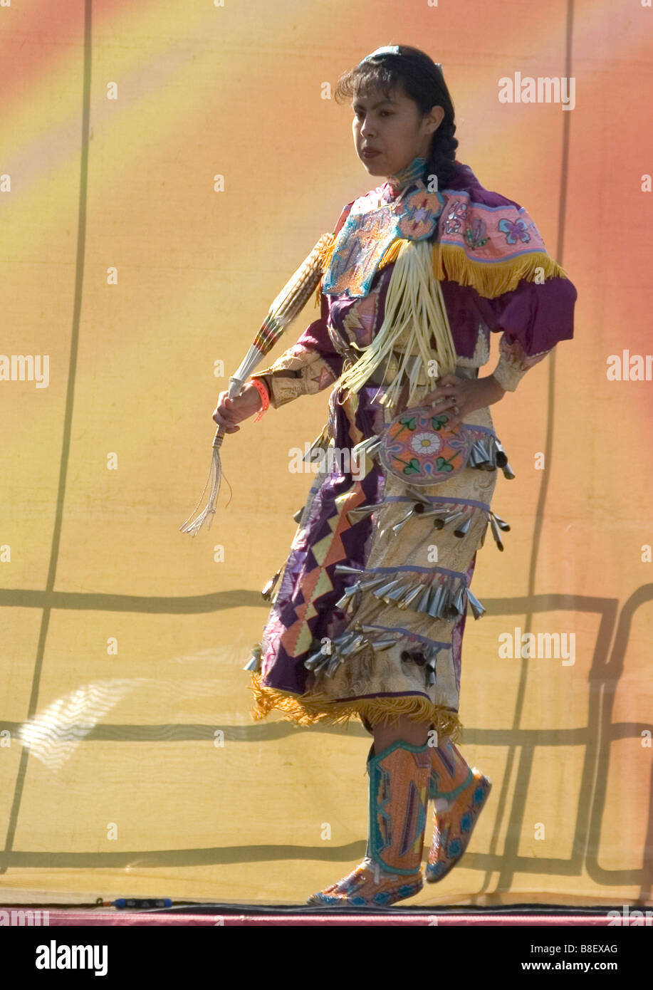 Member of native American dance troupe that performs Native American ...