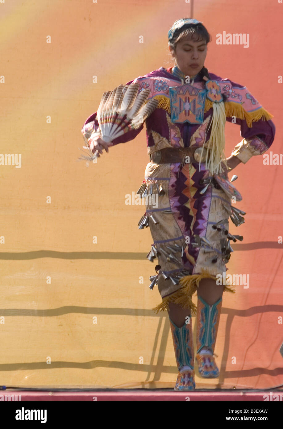 Member of native American dance troupe that performs Native American ...