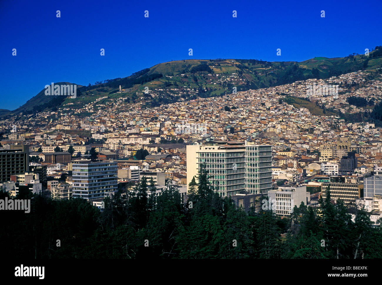 view from above cityscape of capital city of Quito surrounded by Andes ...