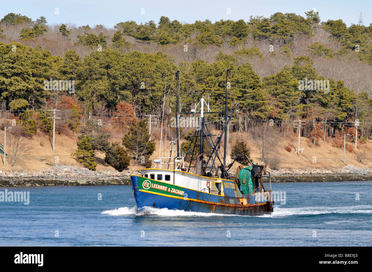 Fishing trawler the Leeanne and Zachary with blue steel hull passing ...