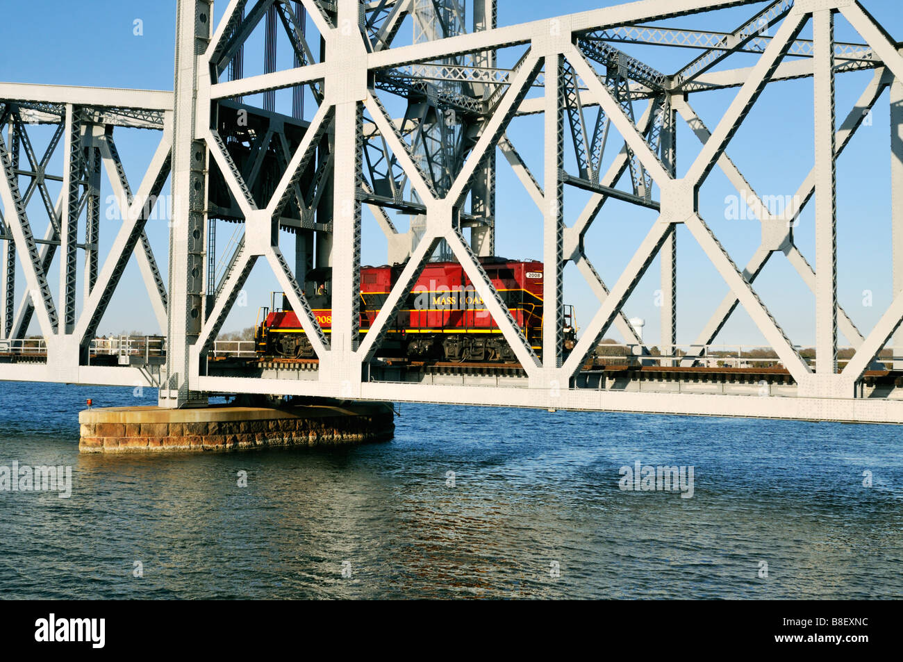 Train engine crossing the waters of the "Cape Cod Canal" over a Stock ...