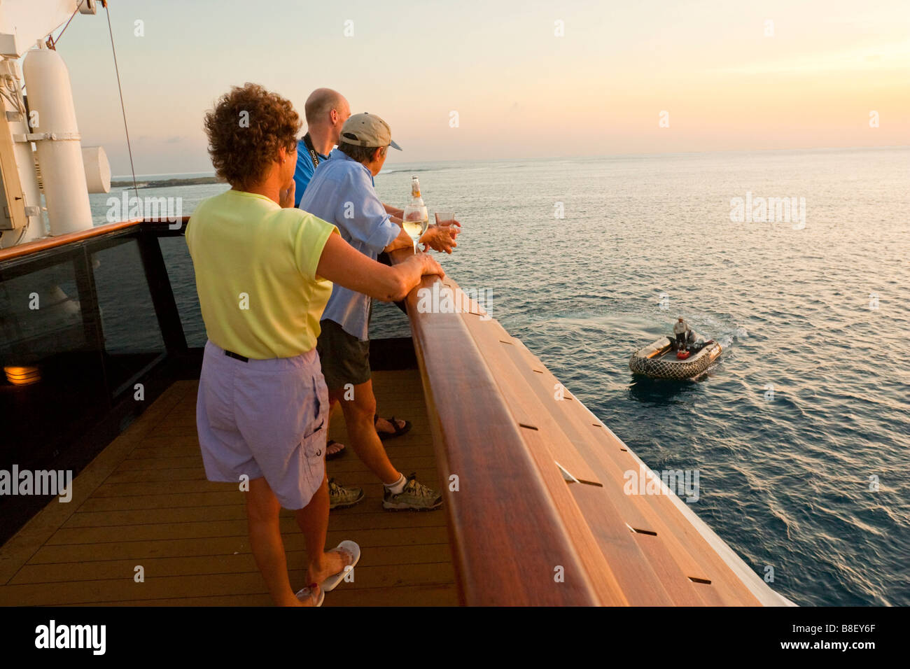 American tourists seniors watching boat loading Stock Photo - Alamy
