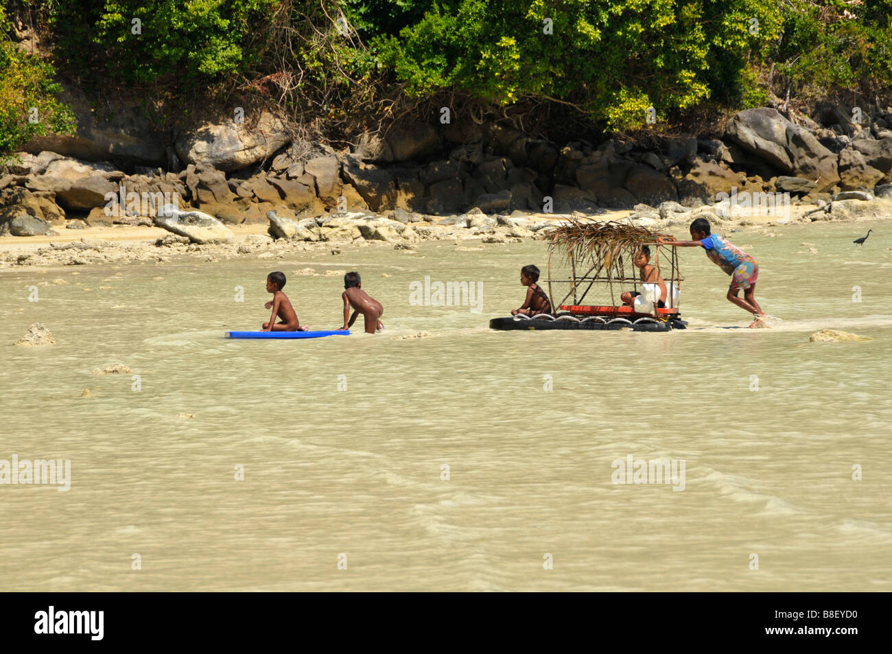 Moken kids enjoy playing with thier small boat,Surin Island,Phangnga ...