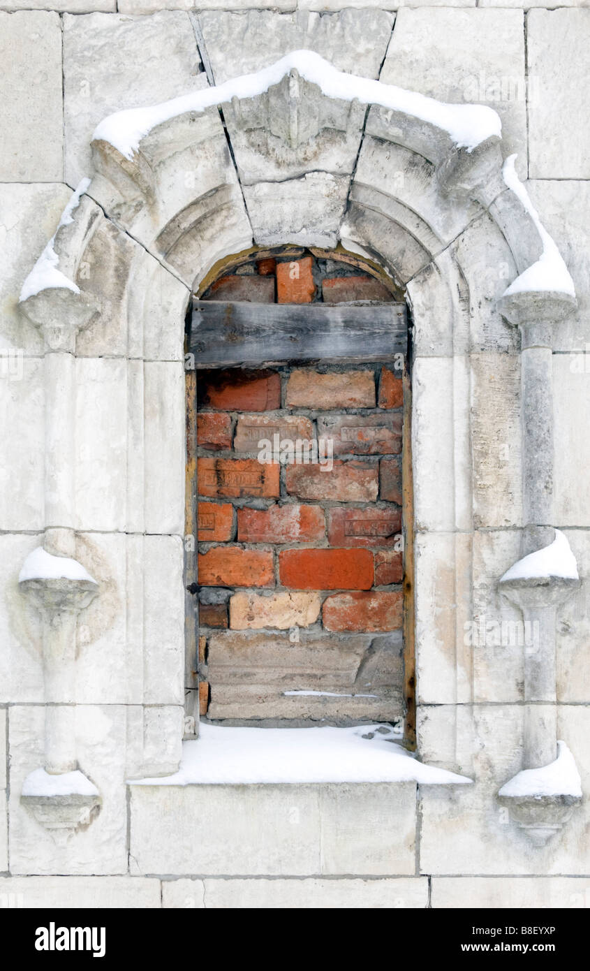 Old building window frame piled up with bricks Stock Photo - Alamy