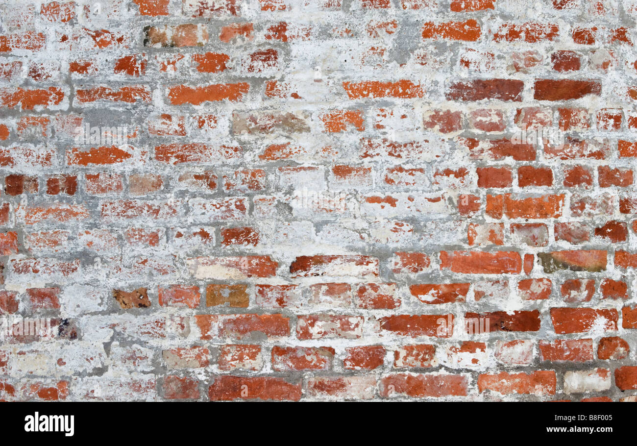 Brick building side wall partly coverd with stucco Stock Photo - Alamy