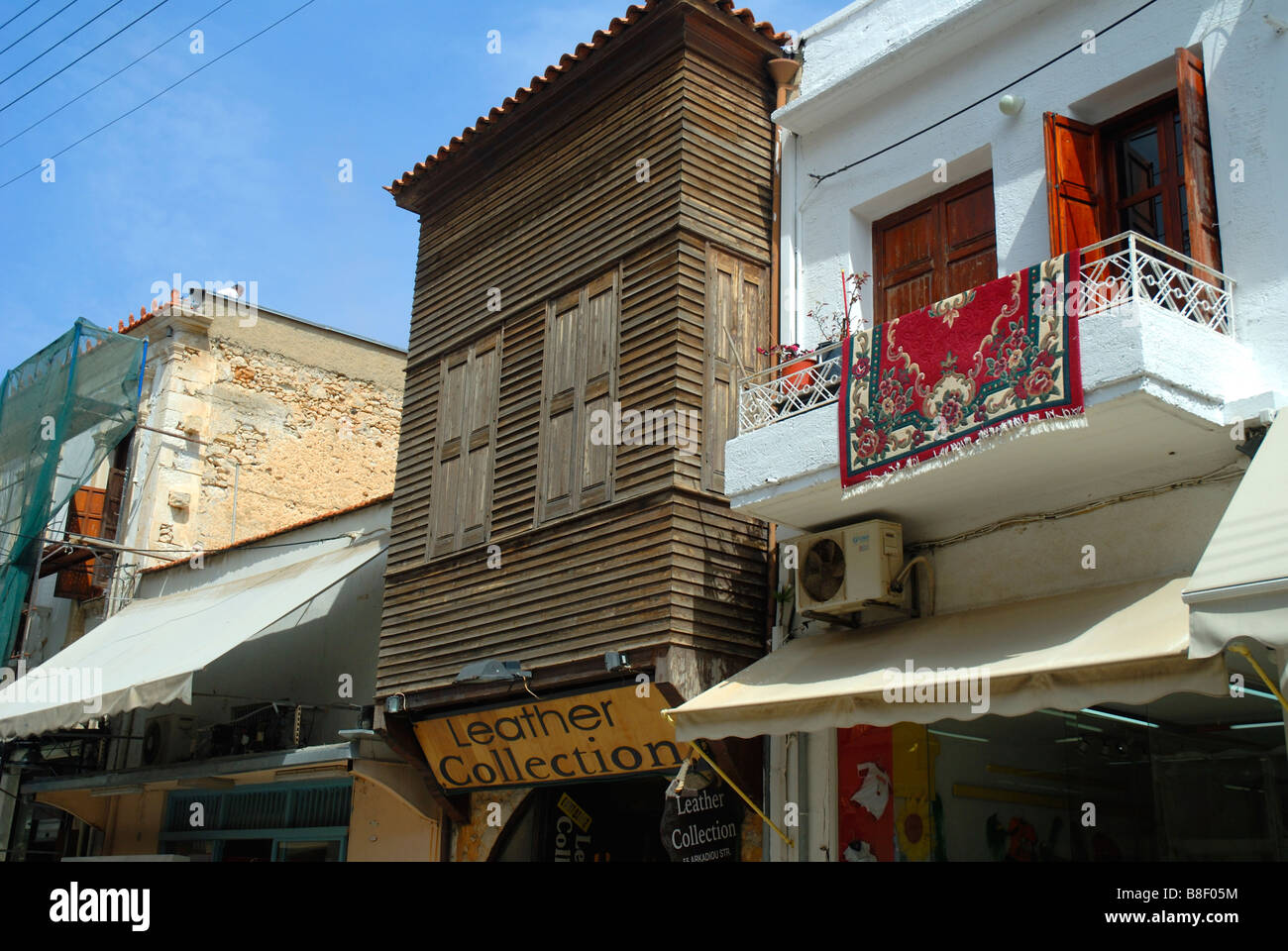 Street with traditional balcony in Rethymno on the Island of Crete ...