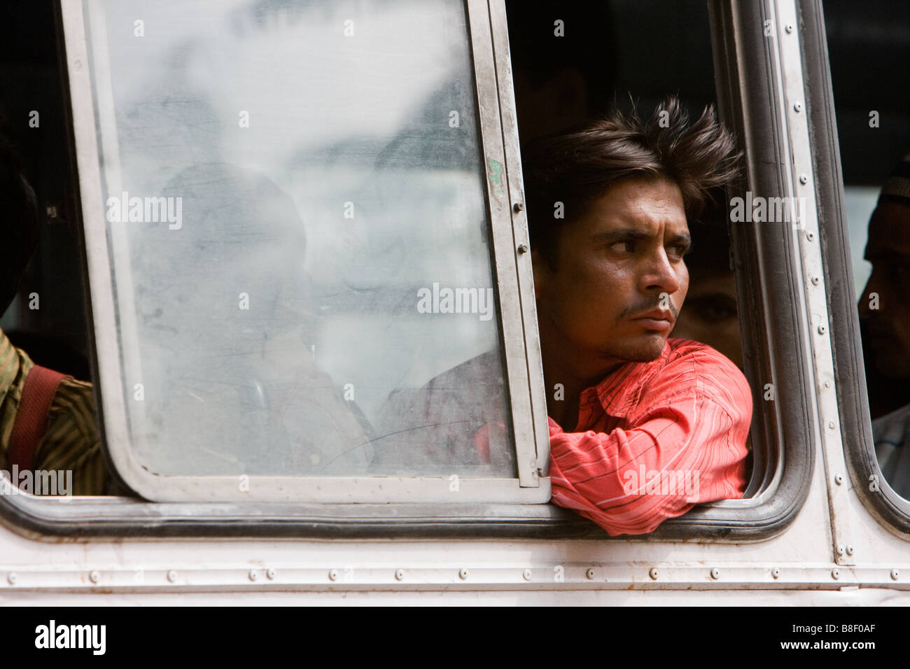 Indian man bus window hi-res stock photography and images - Alamy