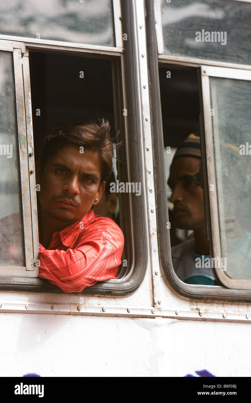 Indian male passenger looking through bus window, Jaipur, India Stock ...