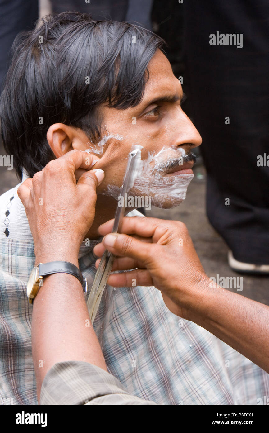 Indian man being shaved in street, Jaipur, India Stock Photo - Alamy