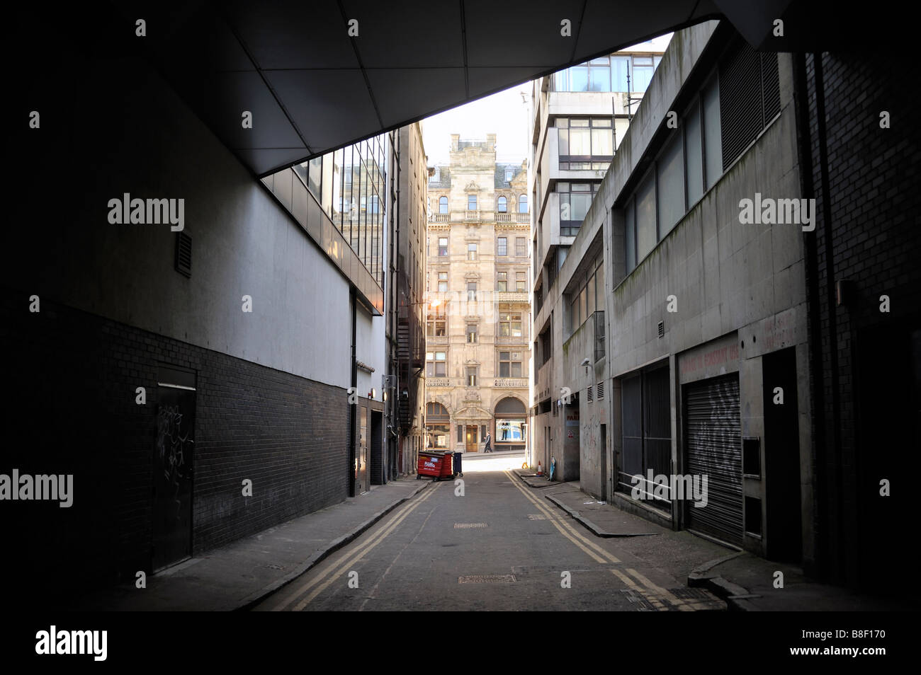 An alleyway providing access for service vehicles Stock Photo - Alamy