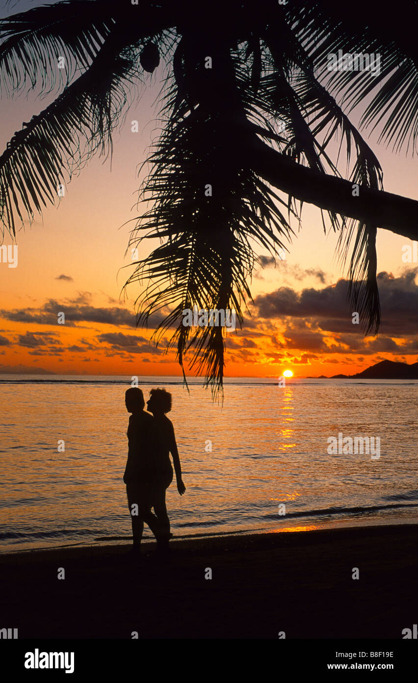 Romantic Sunset at the Beach Stock Photo - Alamy