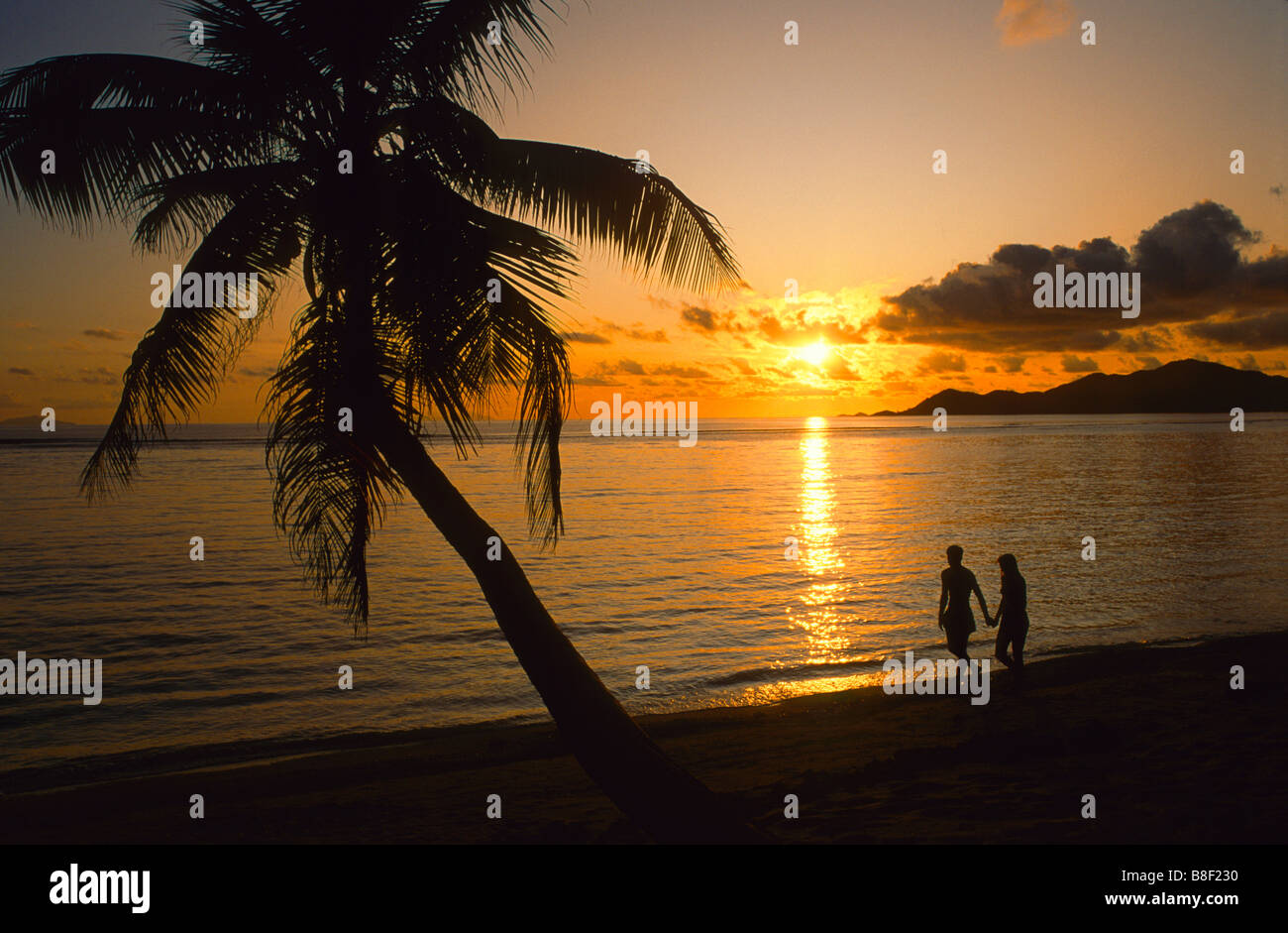 Romantic Sunset at the Beach Stock Photo - Alamy