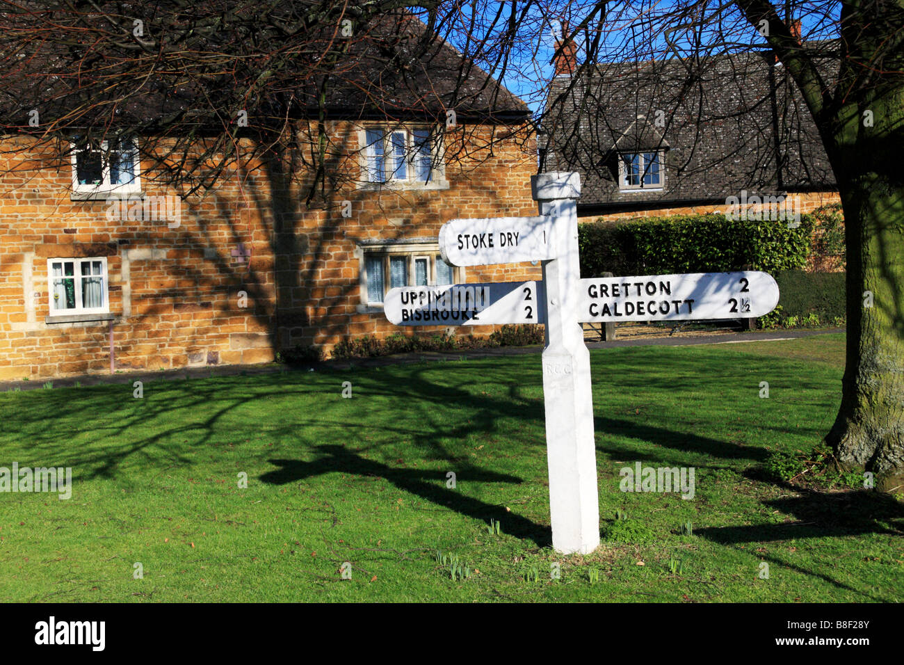 A village finger post with direction signs Stock Photo - Alamy