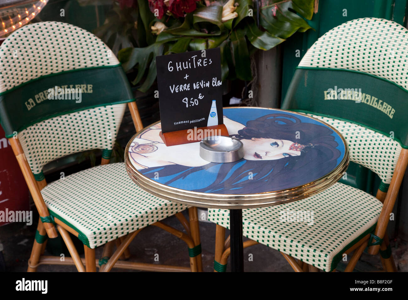 Empty restaurant chairs outside a restaurant in Montmartre, Paris Stock ...
