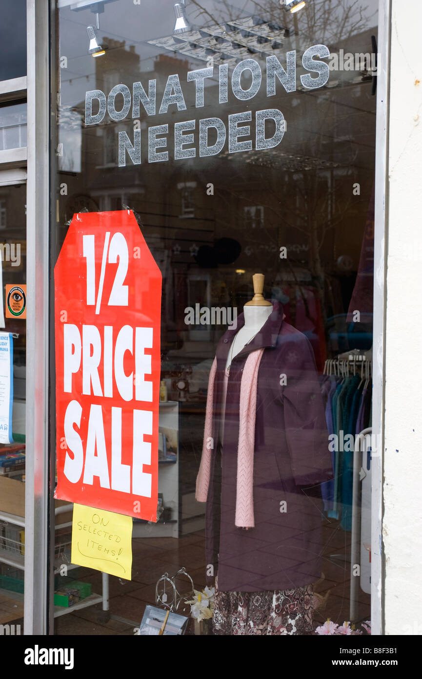 A Charity Shop Window dispay asking for donations Stock Photo - Alamy
