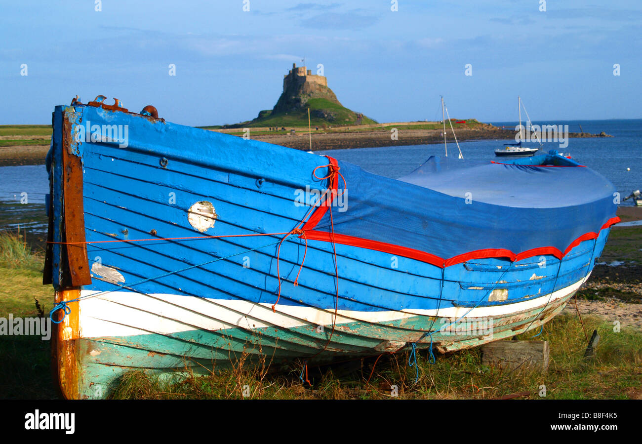 A rowing boat on the beach at Lindisfarne, Holy Island Berwick upon ...