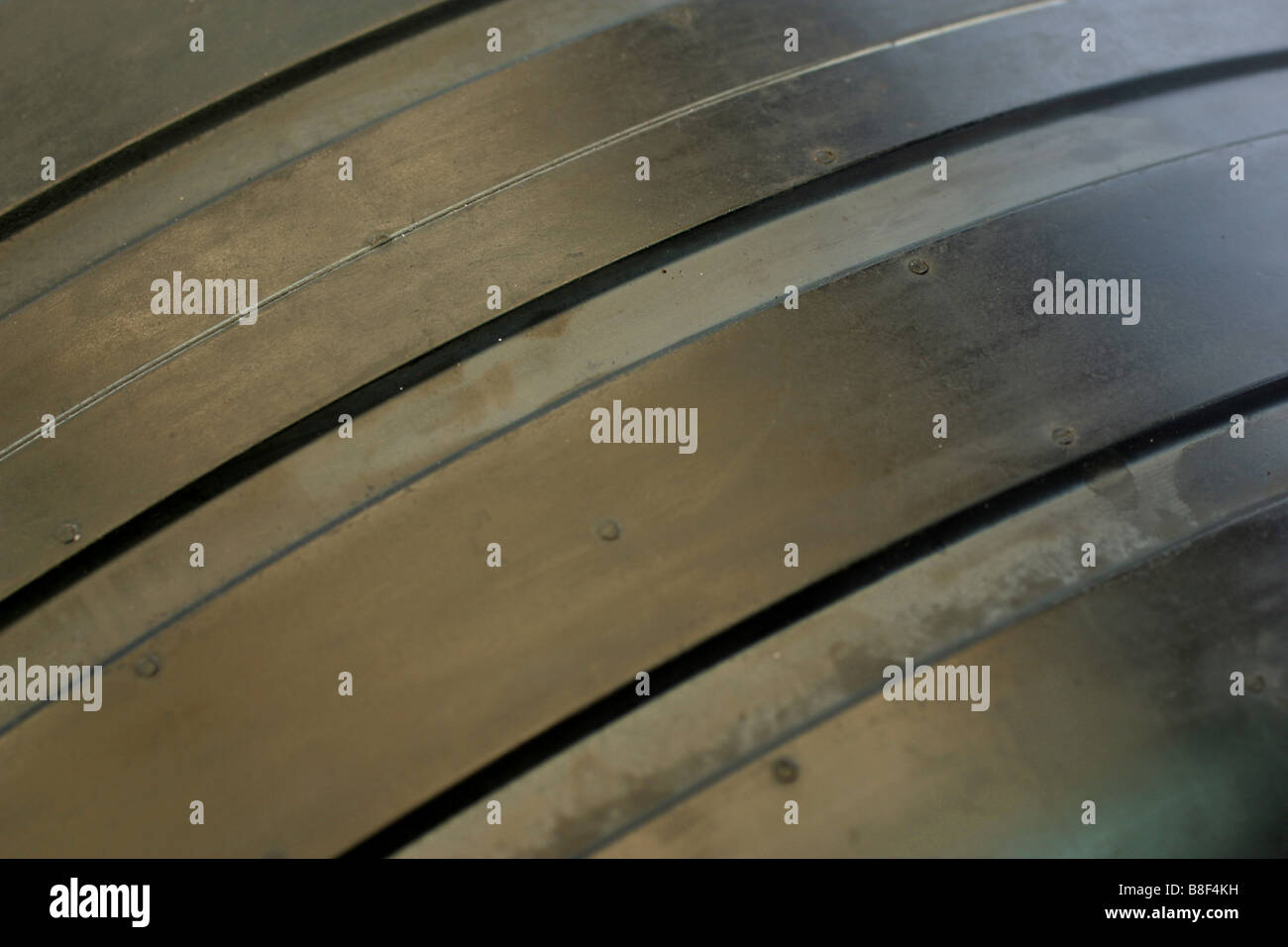 A formula one grooved tyre detail Stock Photo - Alamy