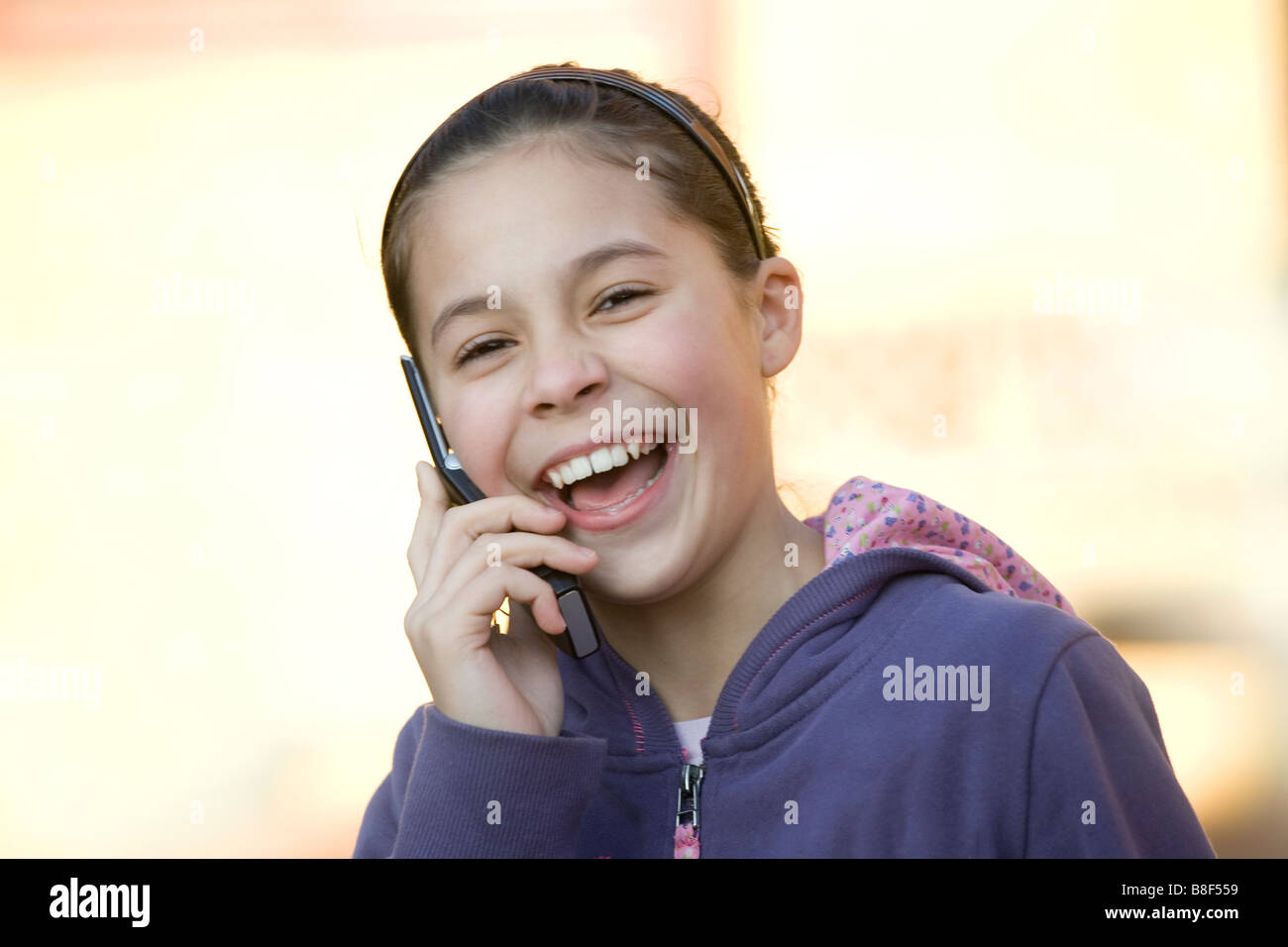 Cell Cellphone Child Girl Happy Kid Mobile phone Stock Photo - Alamy