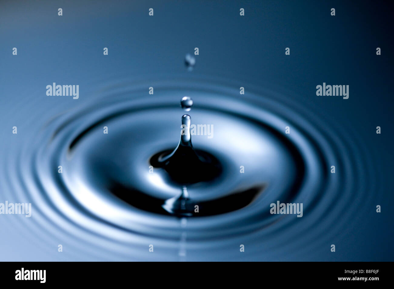 Drops splashing from water Stock Photo - Alamy
