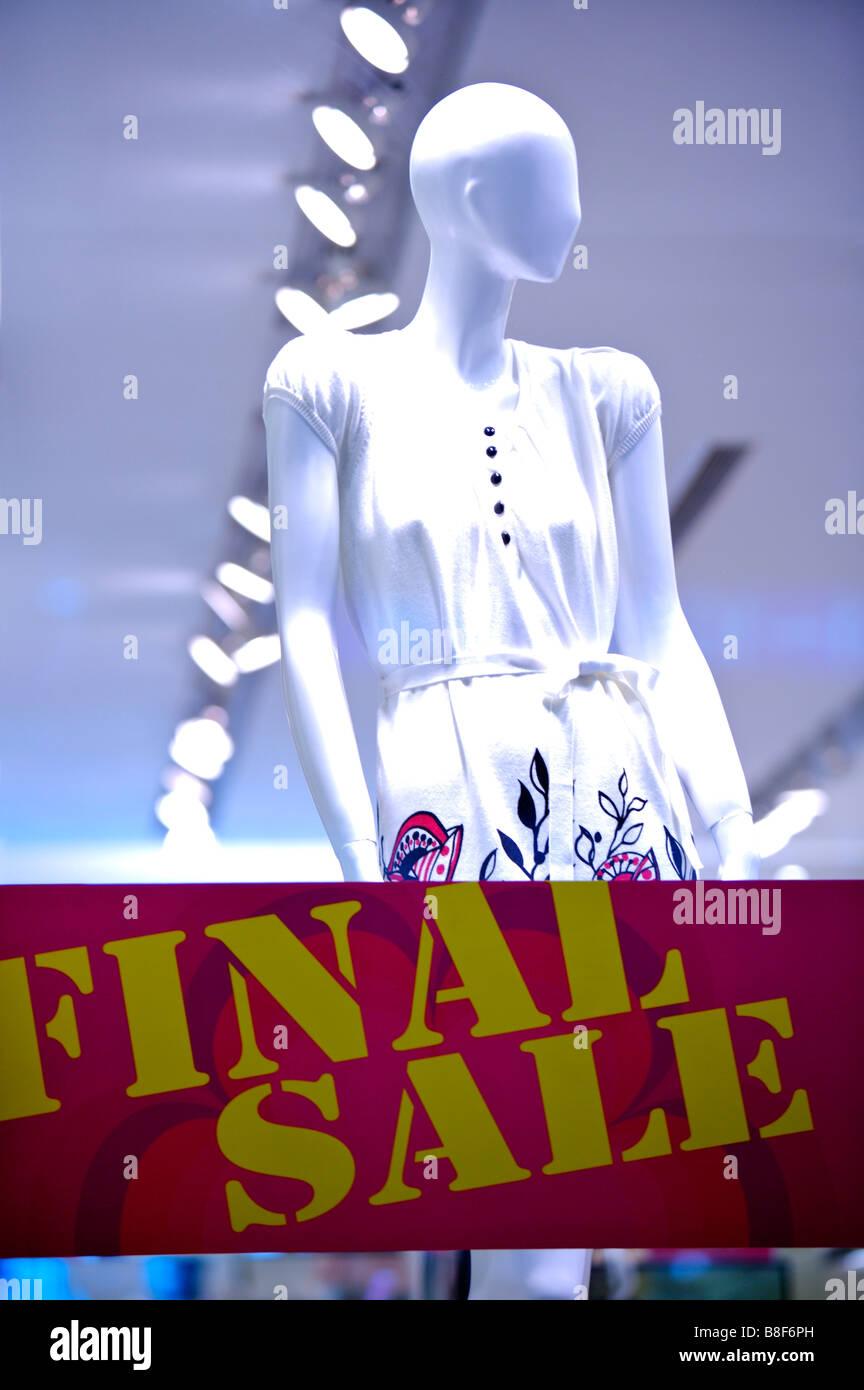 Final Sale sign on the window of a clothing store in front of a ...