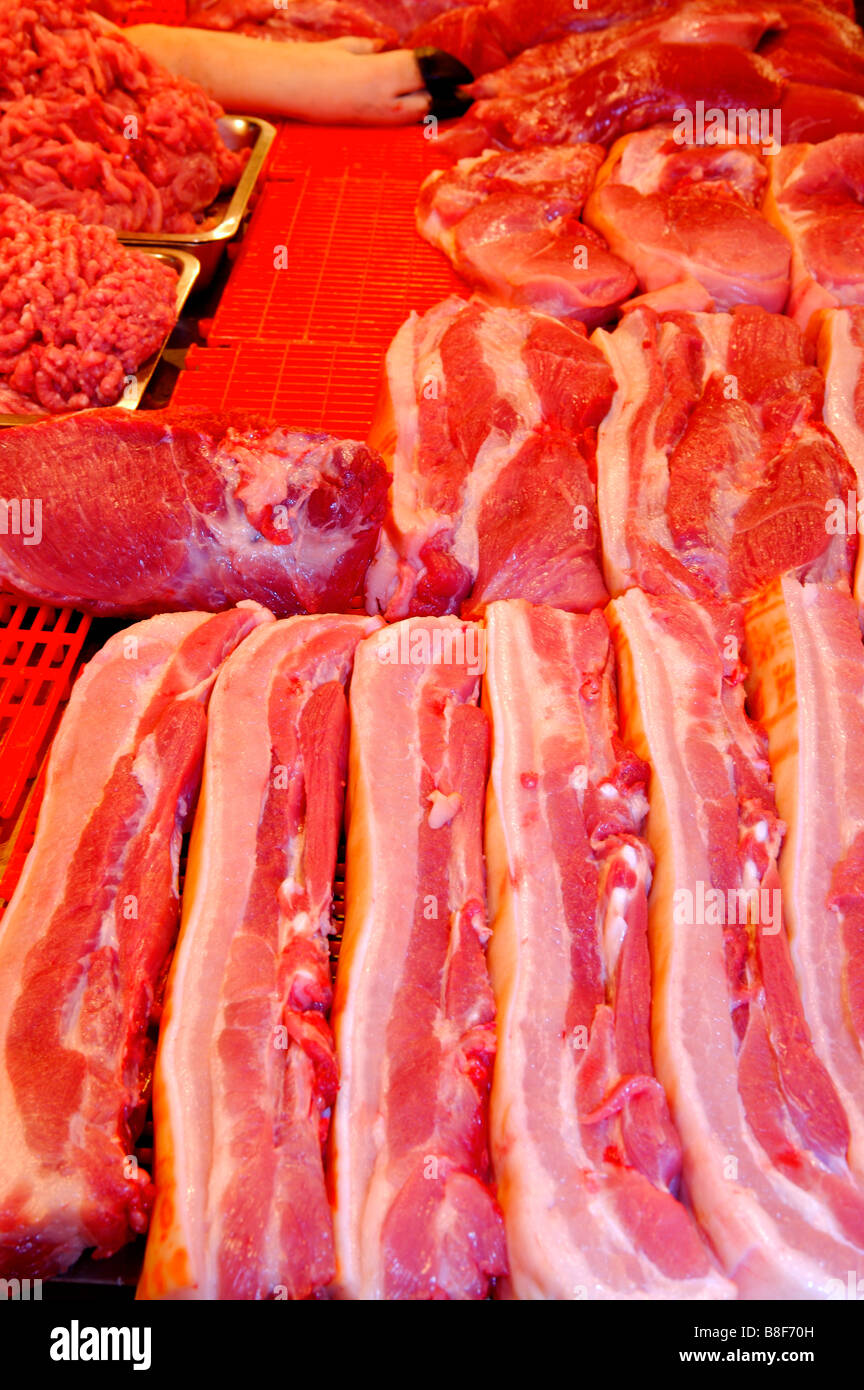 Fresh pork on display at a stall in a market Stock Photo - Alamy