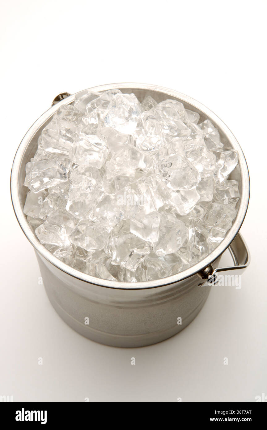 Ice bucket filled with ice cubes Stock Photo - Alamy