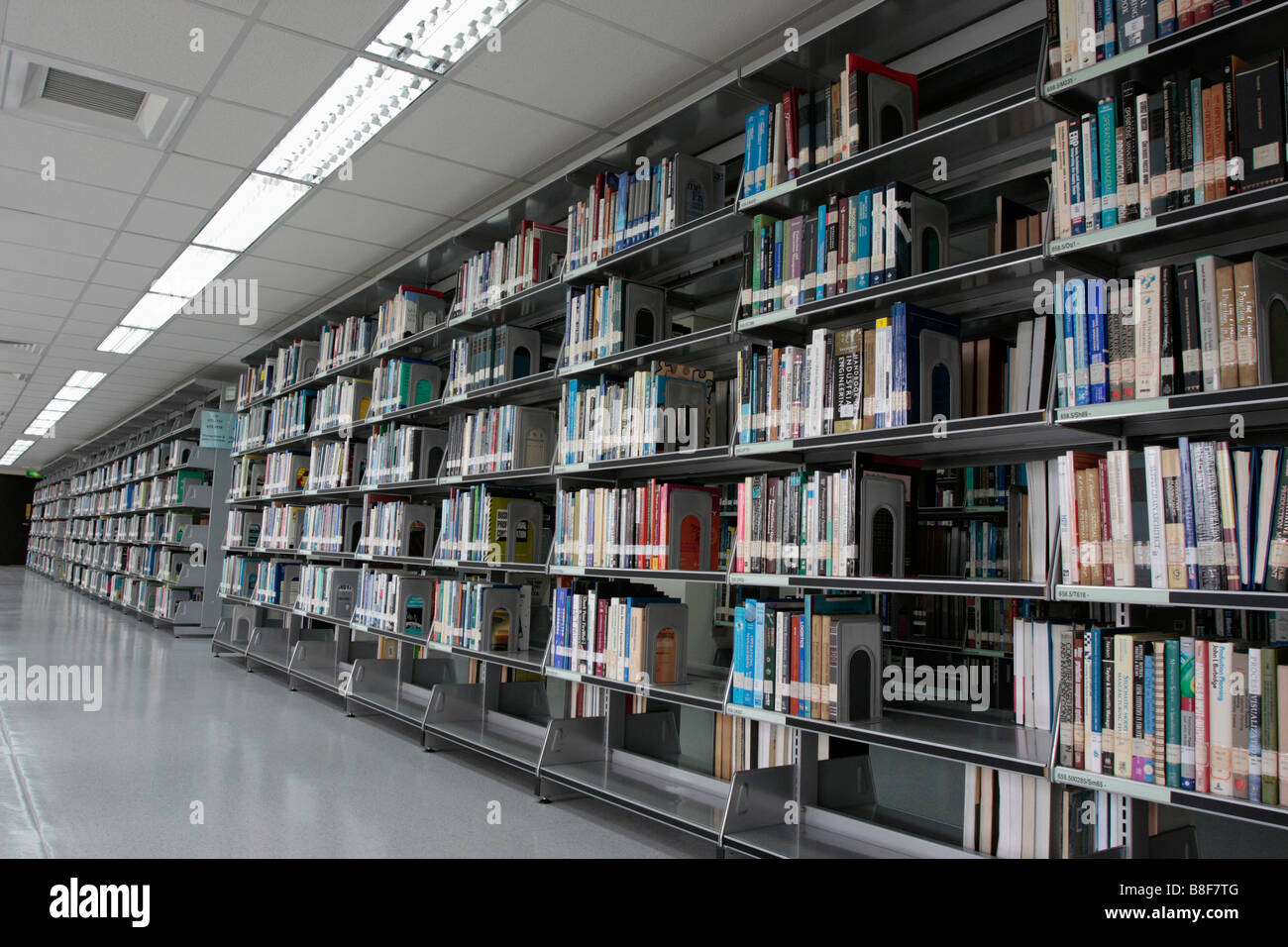 Books and bookshelves display in library Stock Photo - Alamy