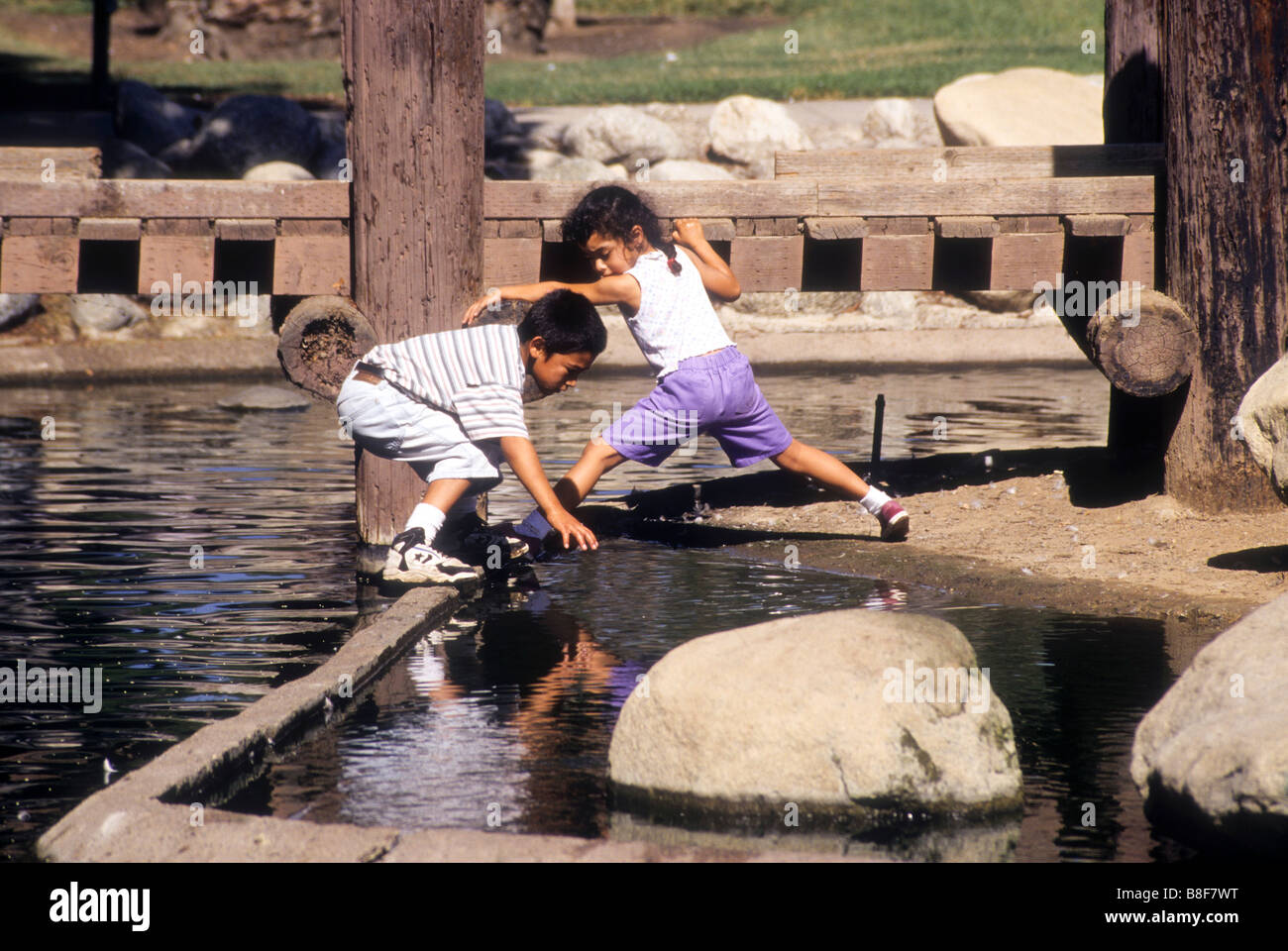 Child city pond hi-res stock photography and images - Alamy