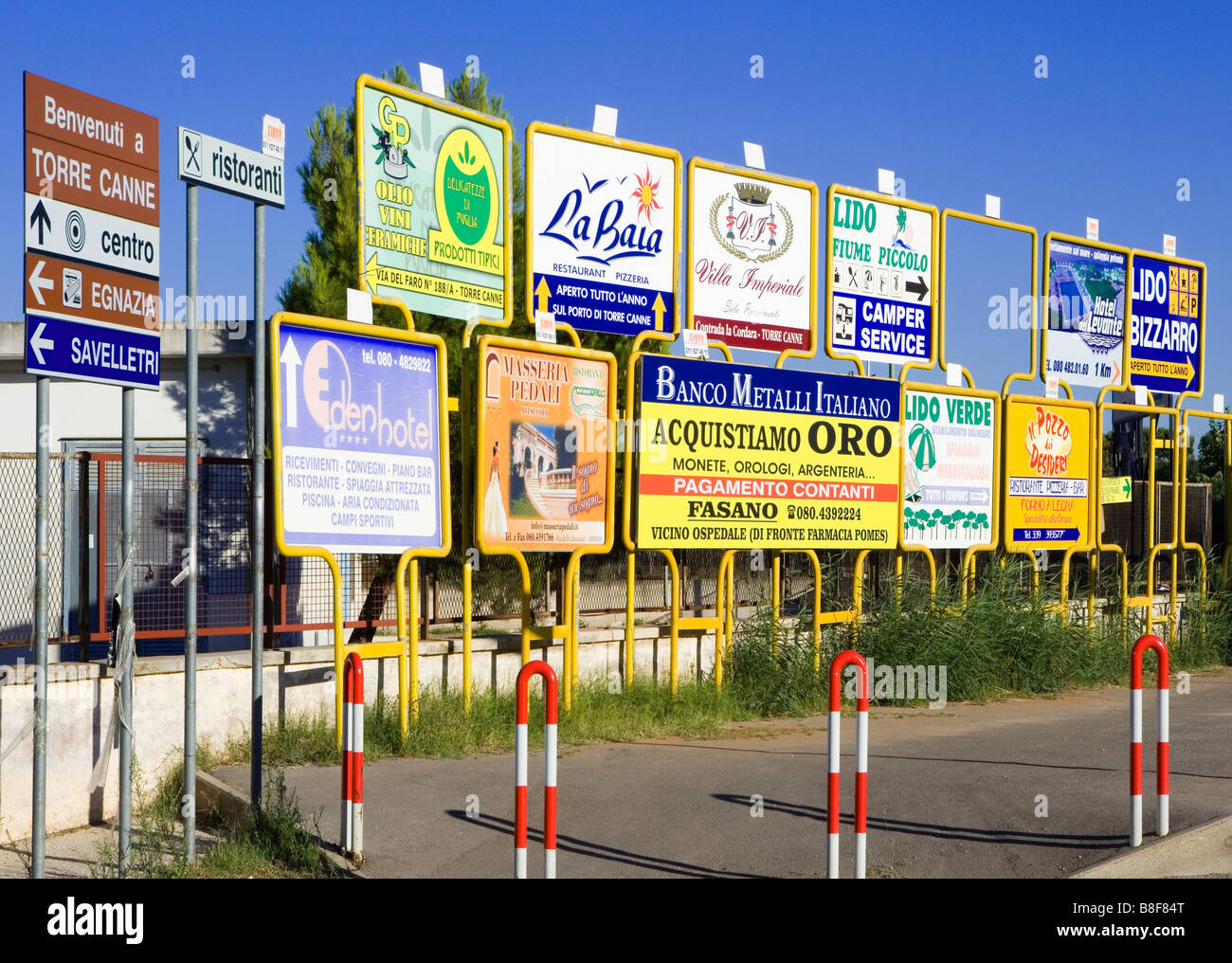 Advertising signs Torre Canne Puglia Italy Stock Photo - Alamy