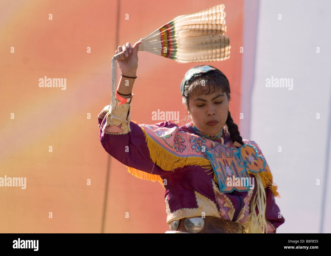 Member of native American dance troupe that performs Native American ...