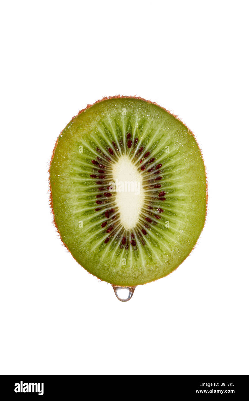 Cross section of a fresh green kiwi fruit Stock Photo - Alamy