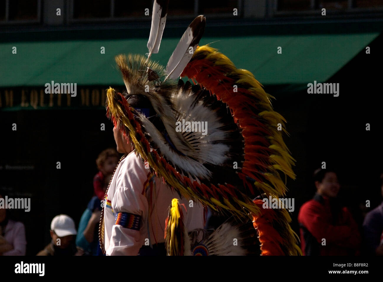 Member of native American dance troupe that performs Native American ...