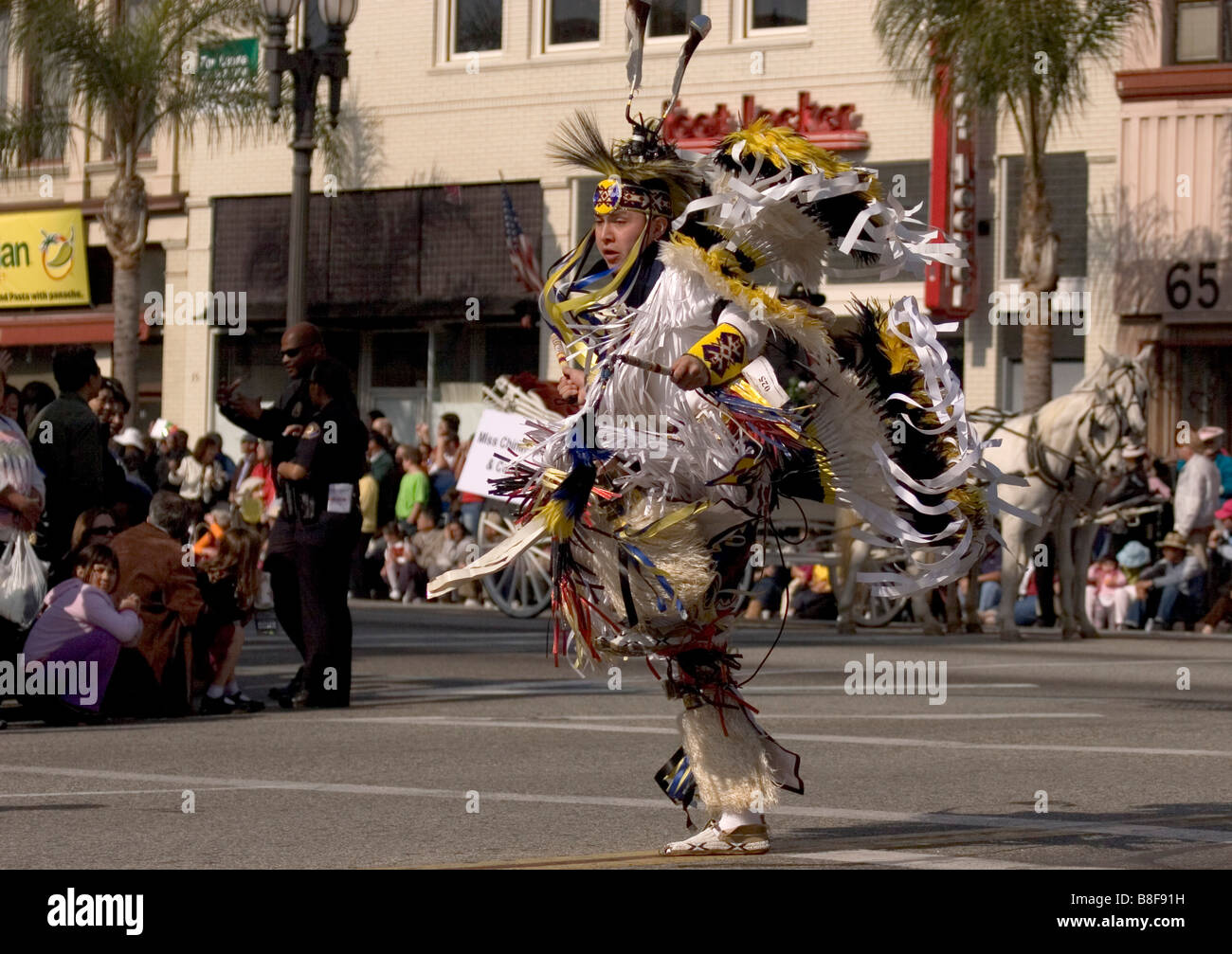 Member of native American dance troupe that performs Native American ...