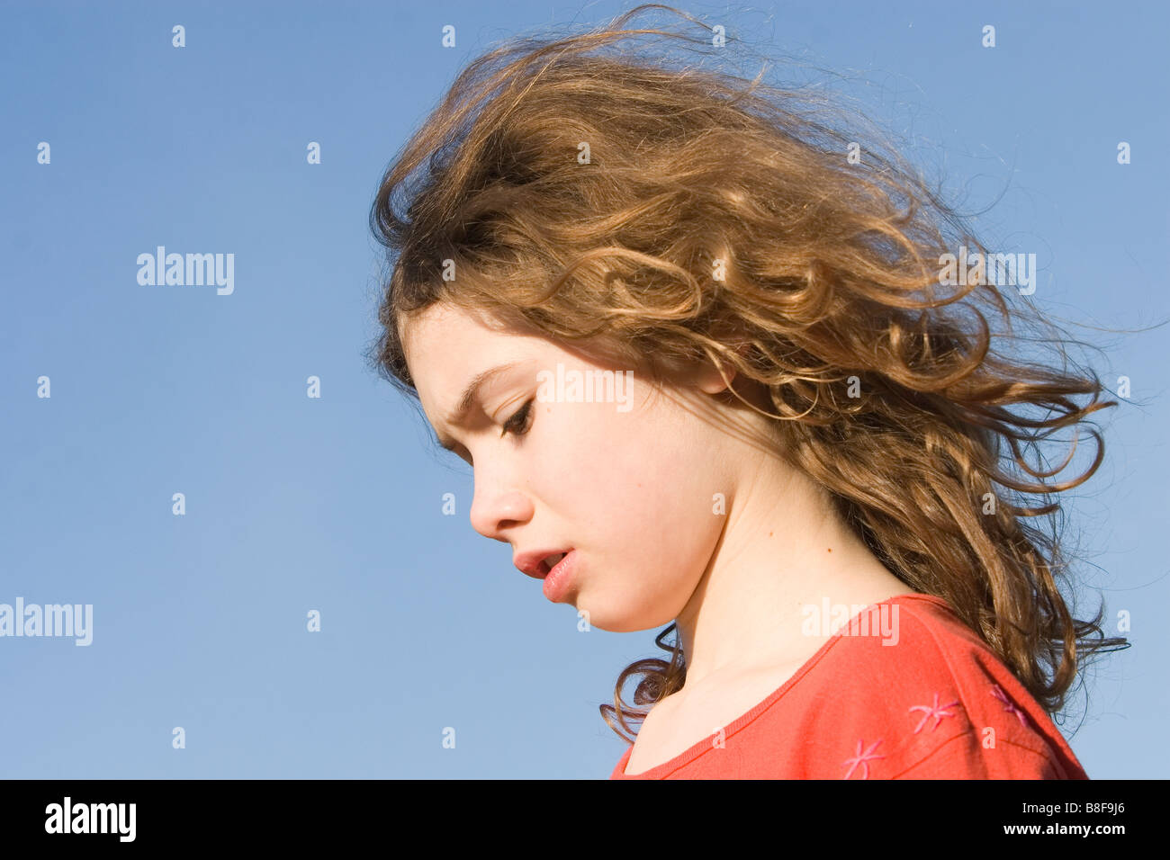 Girl child profile dark hair hi-res stock photography and images - Alamy