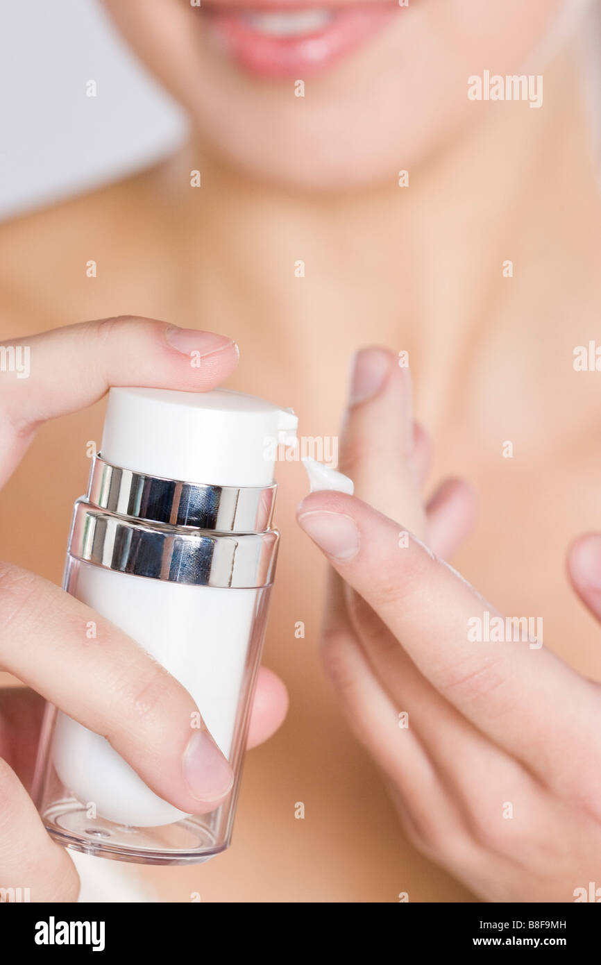 Cream and rub face female hi-res stock photography and images - Alamy