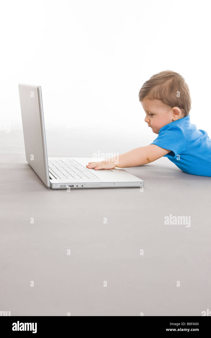 baby with laptop Stock Photo - Alamy
