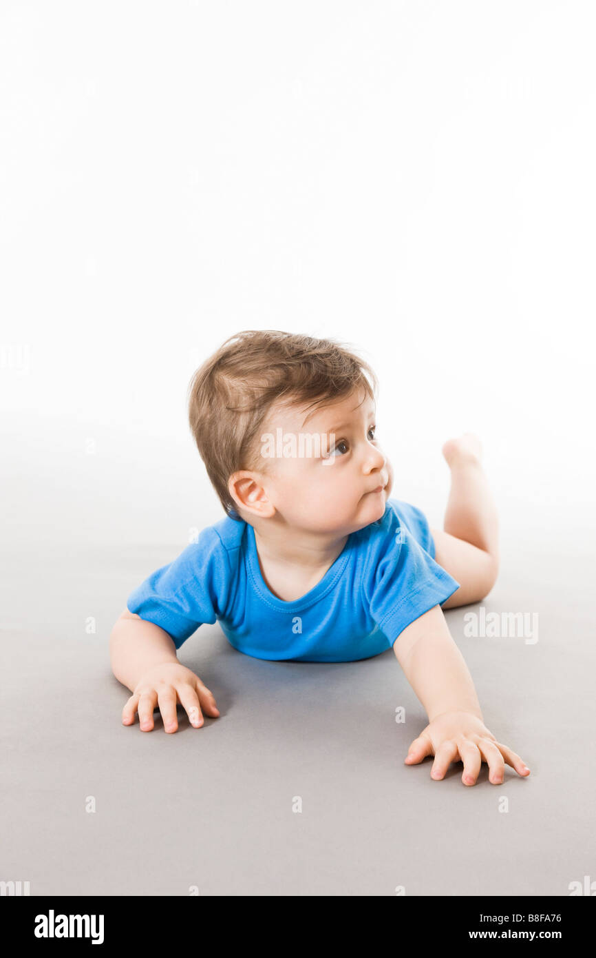 baby boy crawling on the floor Stock Photo - Alamy