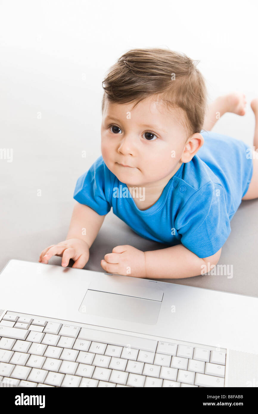 baby with laptop Stock Photo - Alamy