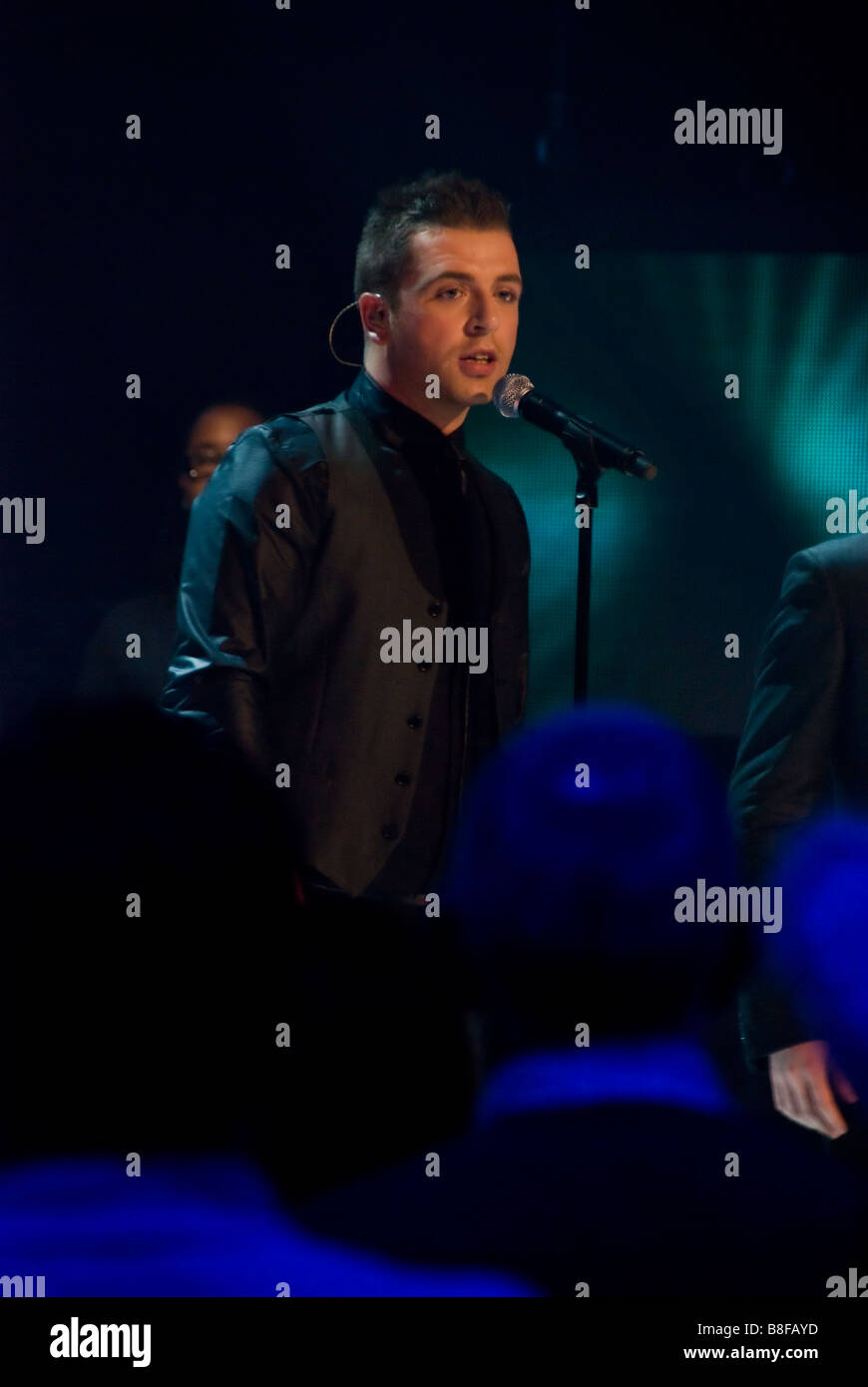 Mark Feehily of Westlife performing on stage Stock Photo - Alamy