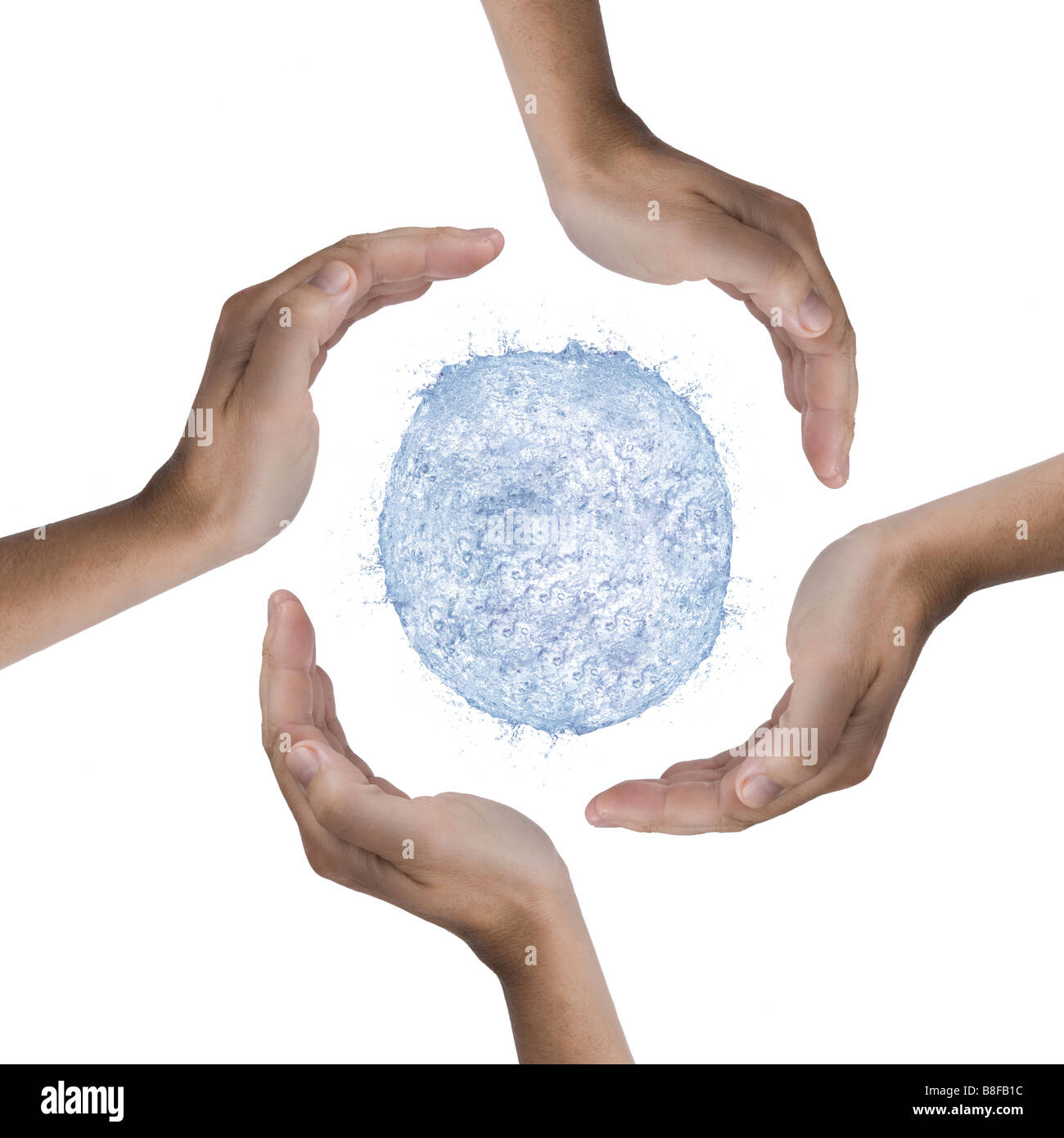Four hands protecting a globe of water Picture was made in a studio ...