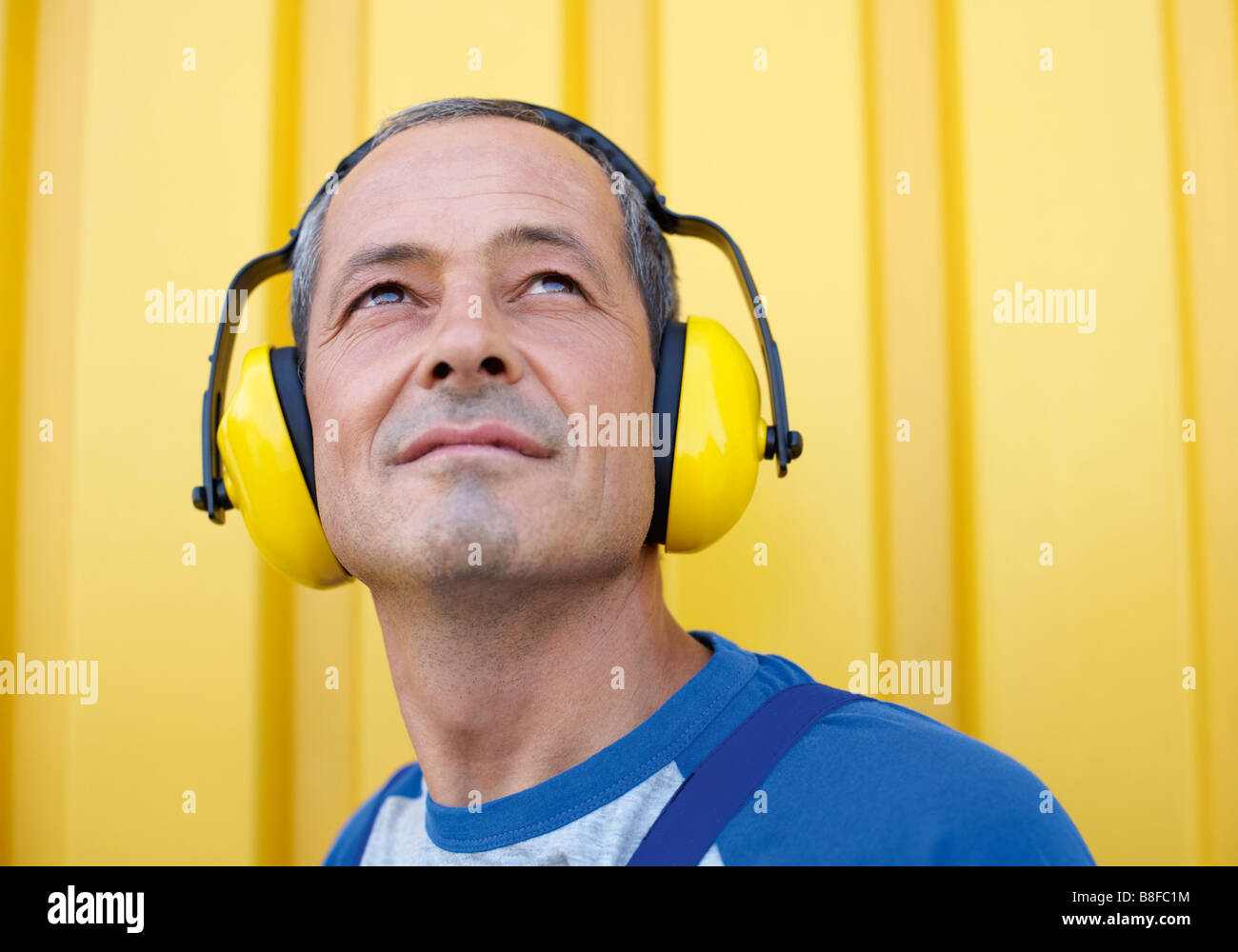 Workman wearing ear protection hi-res stock photography and images - Alamy