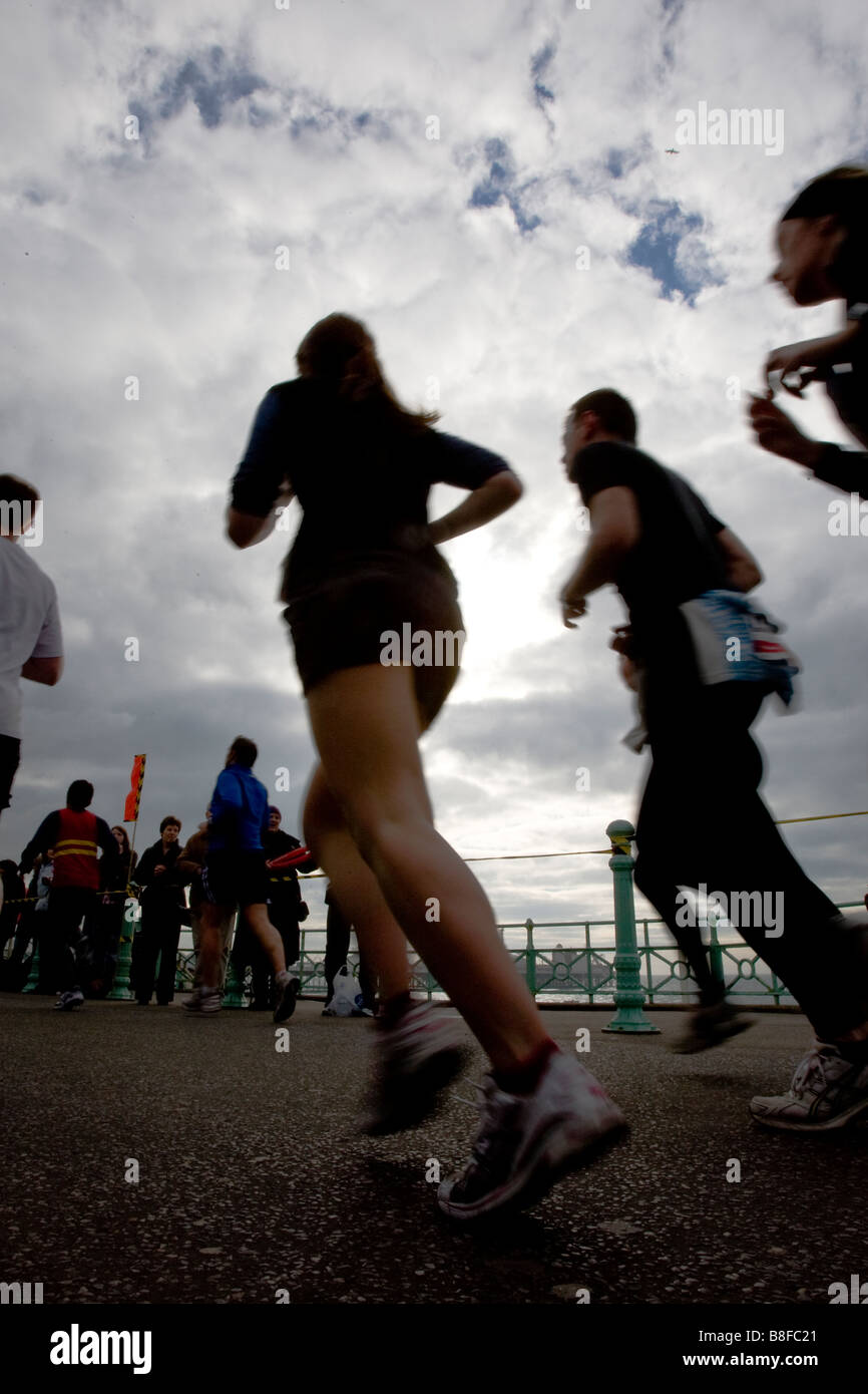 Runners during Sussex Beacon charity half marathon on Brighton seafront ...