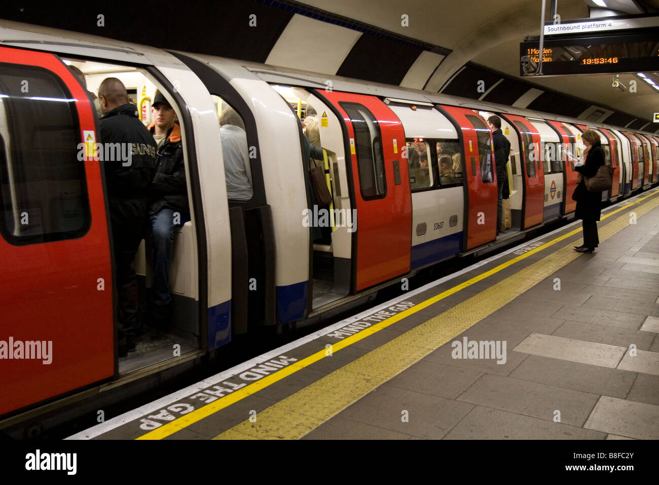 A London Underground train waiting at a station Stock Photo - Alamy