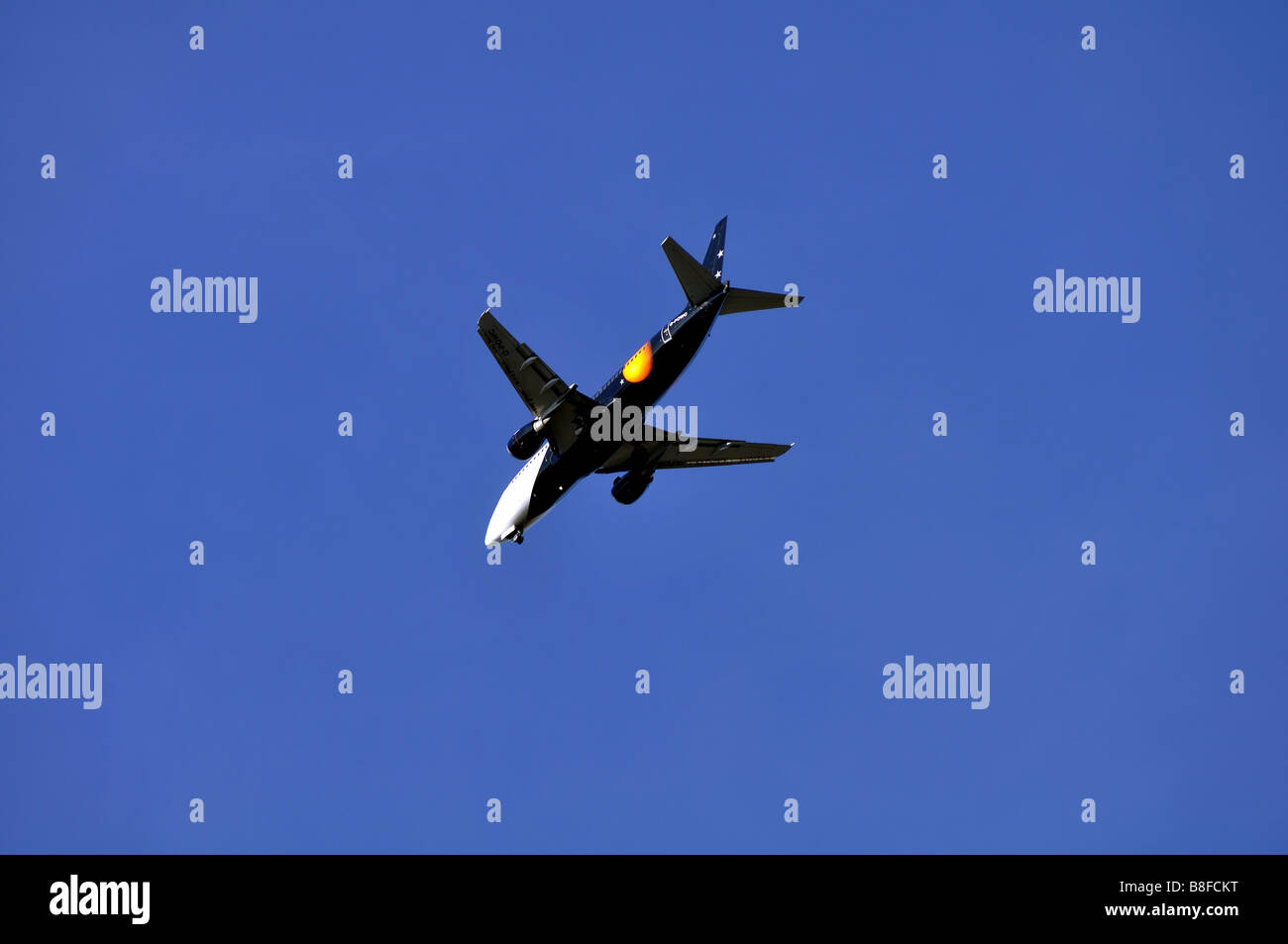 Titan Airways Boeing 737 aircraft seen from below Stock Photo - Alamy