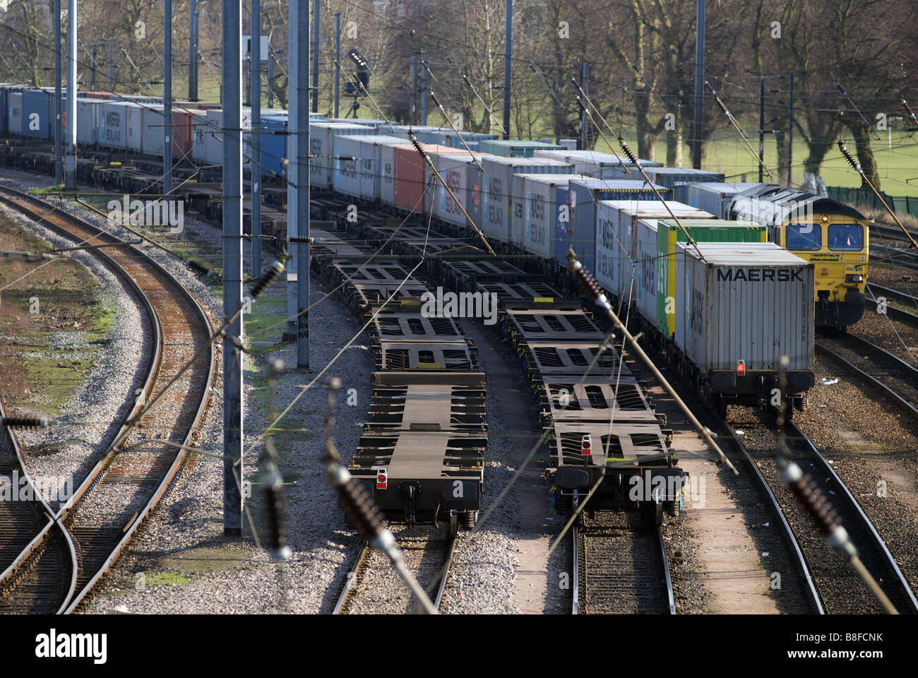 Containers being transported by rail, Ipswich, Suffolk, UK Stock Photo ...