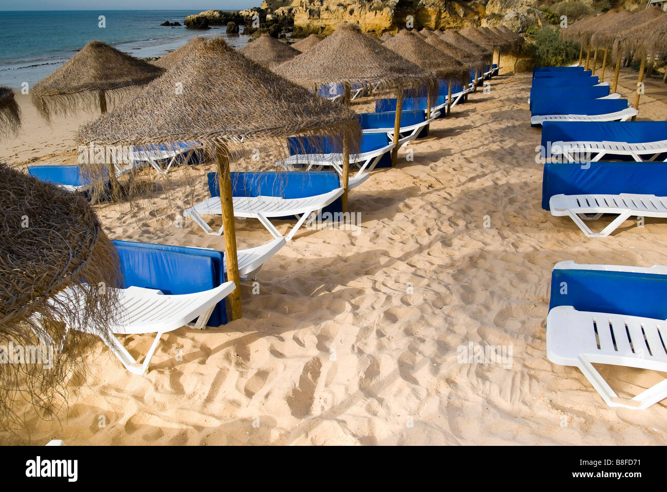 Sunbeds on Oura beach in Albufeira Portugal Stock Photo - Alamy