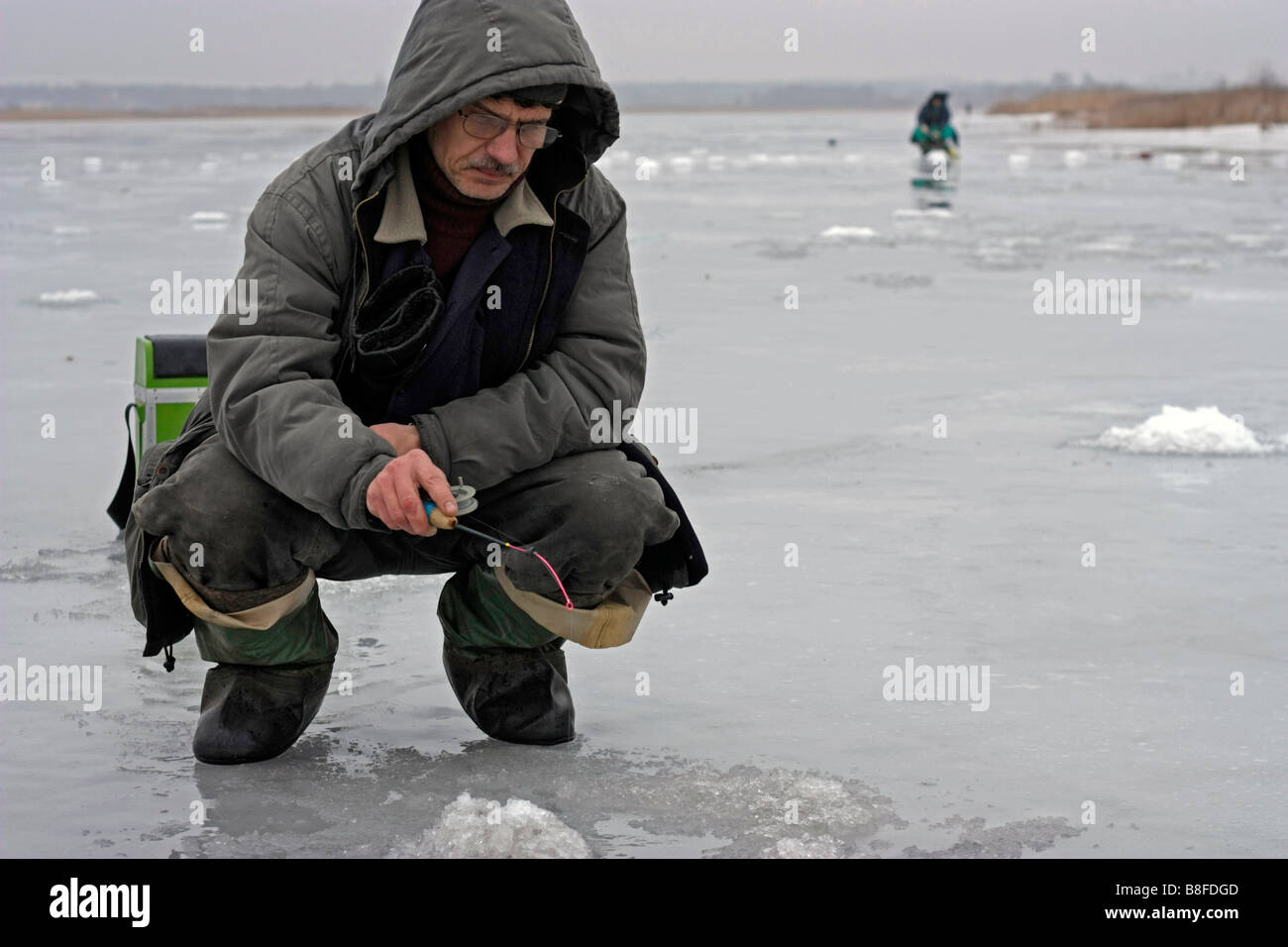 Riga latvia fisherman winter hi-res stock photography and images - Alamy