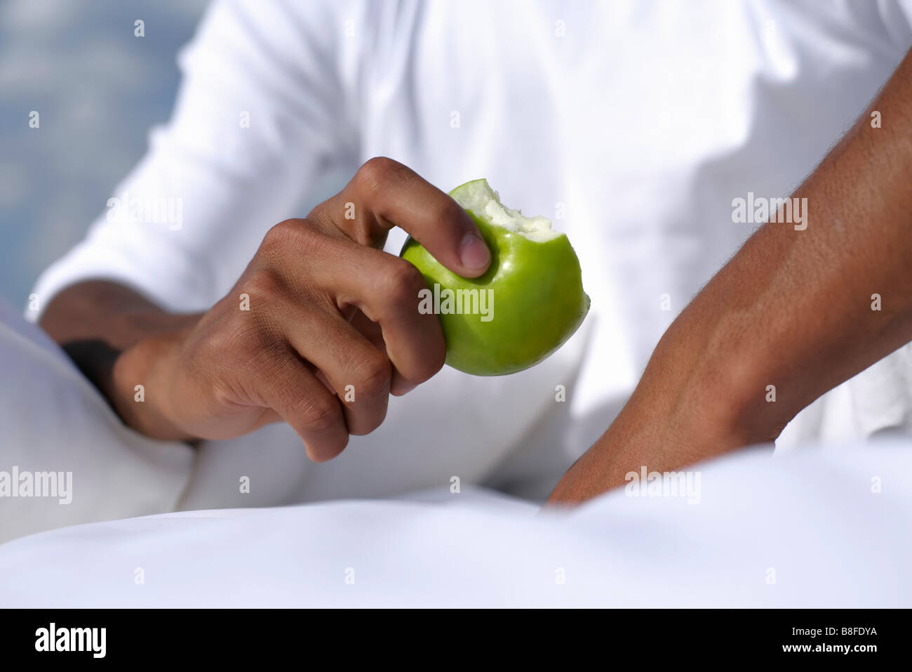 Man eating an apple Stock Photo - Alamy