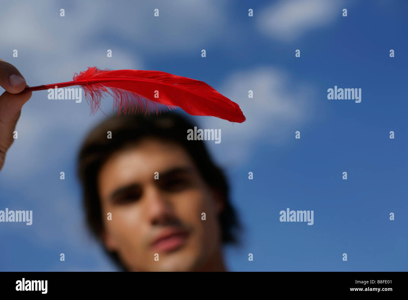 Feather in the hair hi-res stock photography and images - Alamy