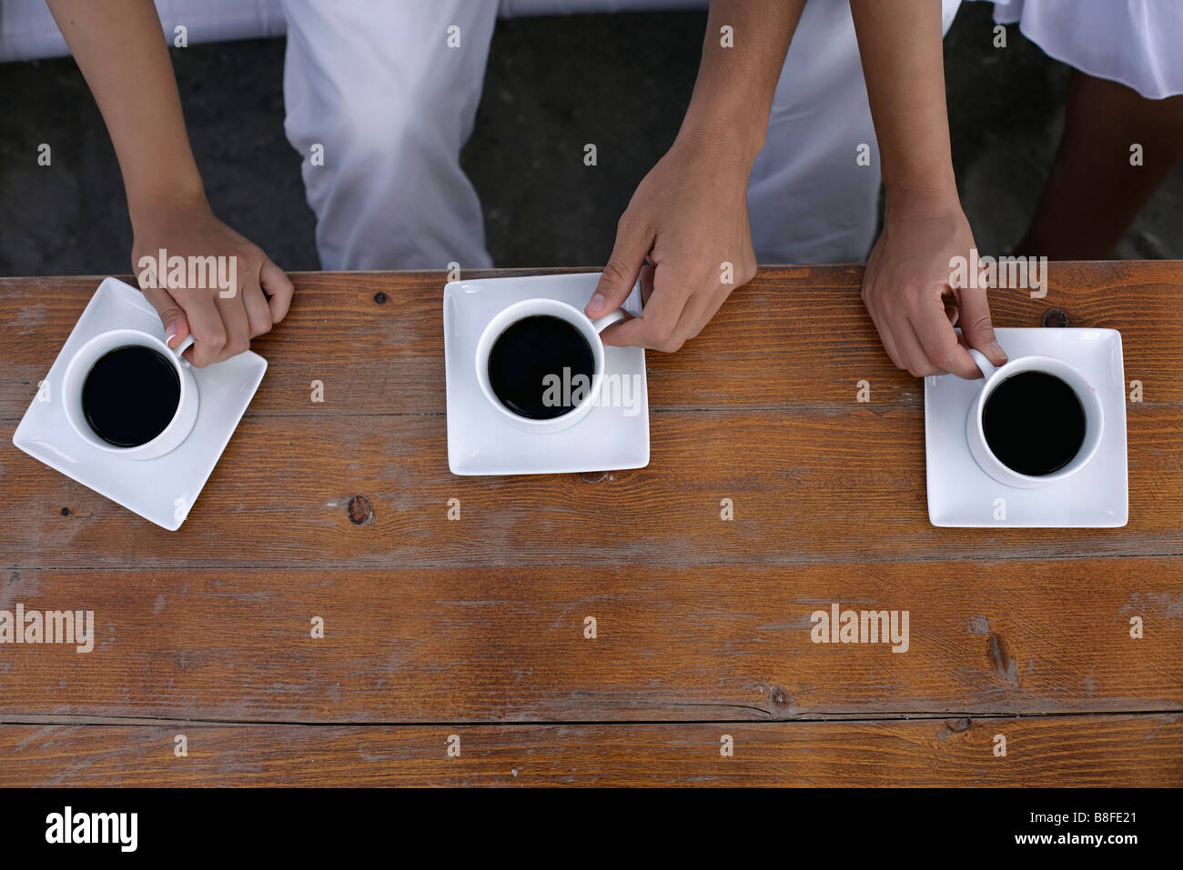 Three cups of coffee Stock Photo - Alamy